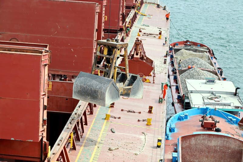 Loading Bulk Cargo of Limestone from Barges into a Bulk Carrier by ...