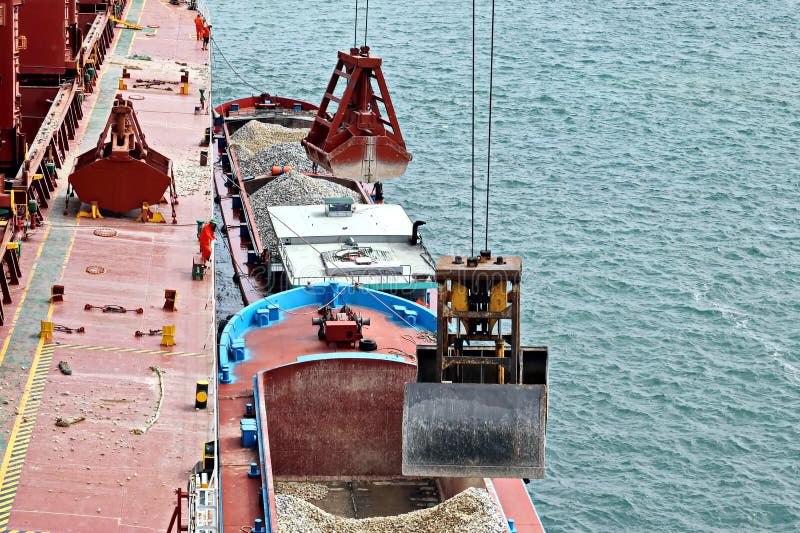 Loading Bulk Cargo of Limestone from Barges into a Bulk Carrier by ...