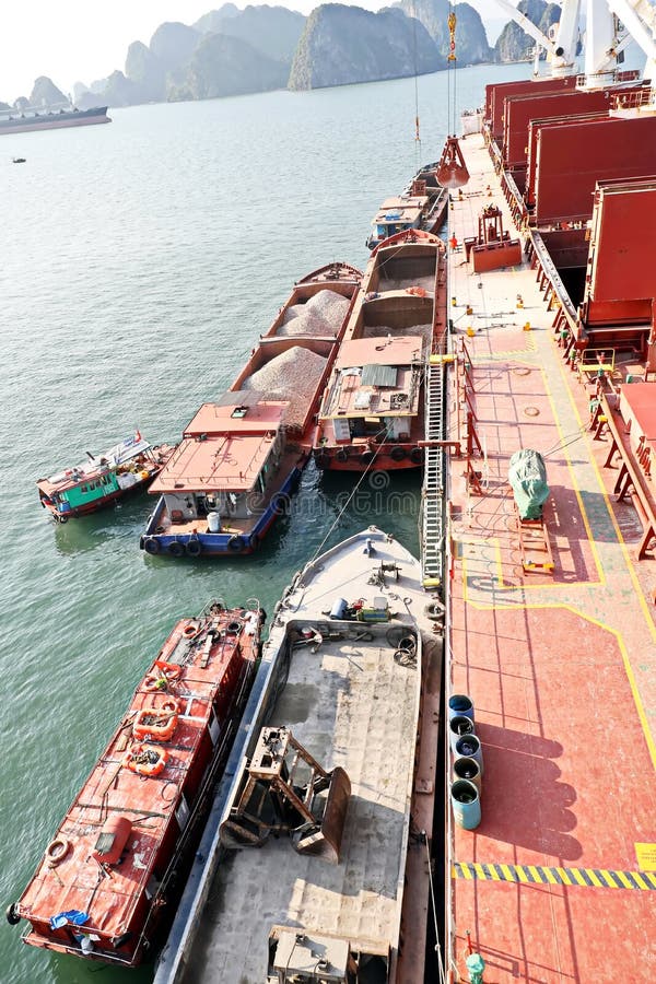 Loading Bulk Cargo of Limestone from Barges into a Bulk Carrier by ...