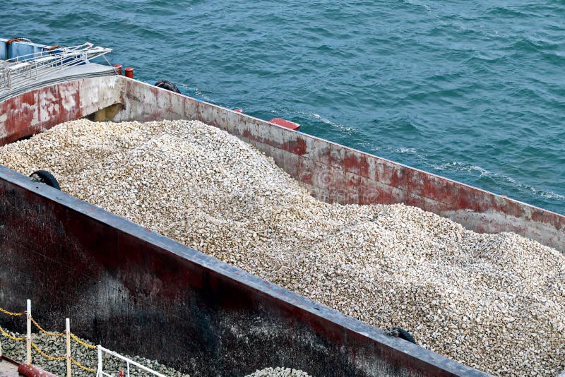 Loading Bulk Cargo of Limestone from Barges into a Bulk Carrier by ...
