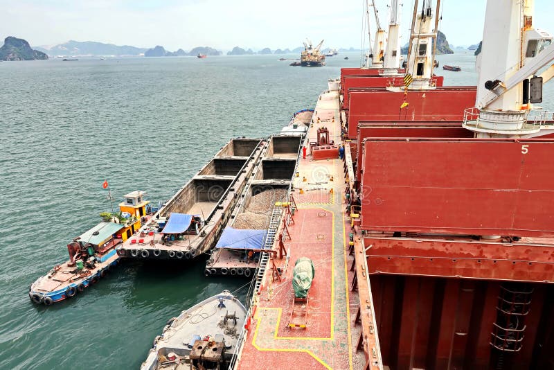 Loading Bulk Cargo of Limestone from Barges into a Bulk Carrier by ...