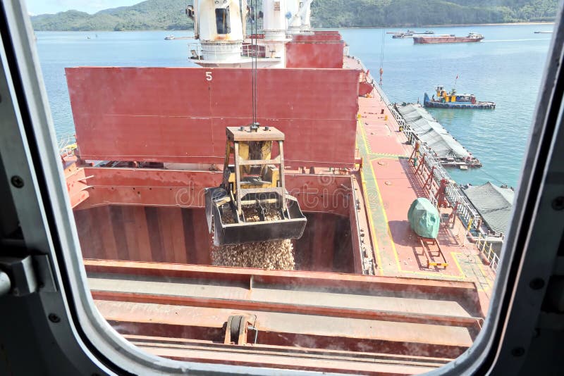 Loading Bulk Cargo of Limestone from Barges into a Bulk Carrier by ...