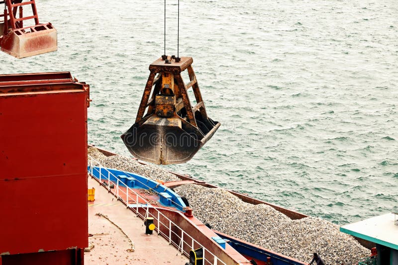 Loading Bulk Cargo of Limestone from Barges into a Bulk Carrier by ...