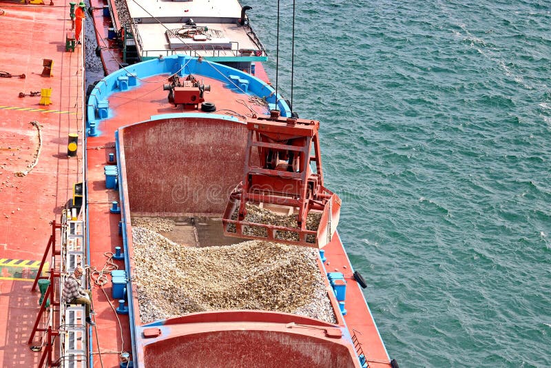 Loading Bulk Cargo of Limestone from Barges into a Bulk Carrier by ...