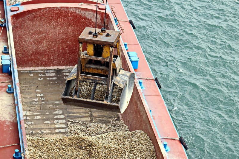 Loading Bulk Cargo of Limestone from Barges into a Bulk Carrier by ...