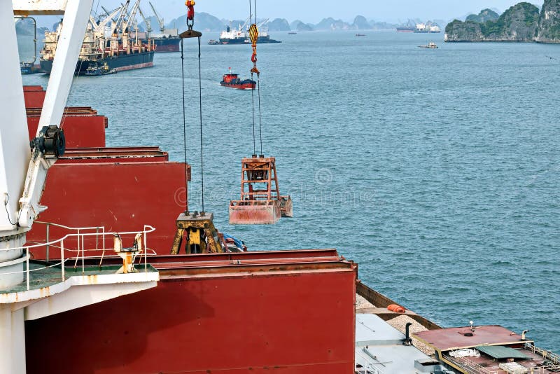 Loading Bulk Cargo of Limestone from Barges into a Bulk Carrier by ...