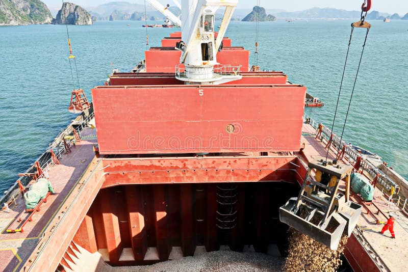 Loading Bulk Cargo of Limestone from Barges into a Bulk Carrier by ...