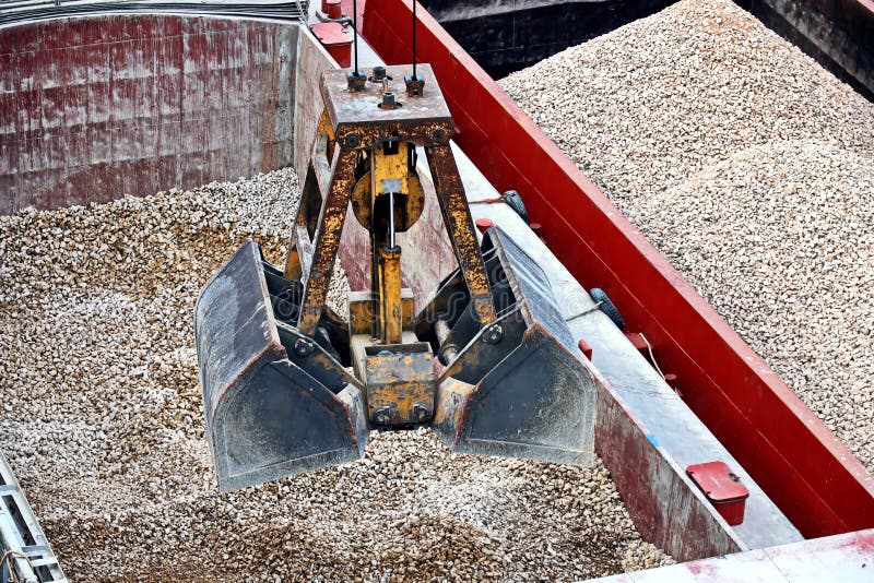 Loading Bulk Cargo of Limestone from Barges into a Bulk Carrier by ...