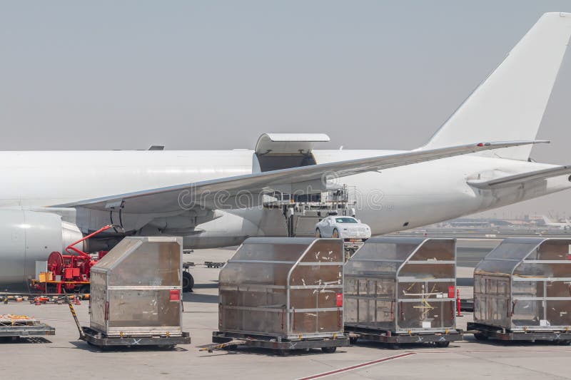 Loading a Car into a Cargo Airplane Stock Photo - Image of flight ...