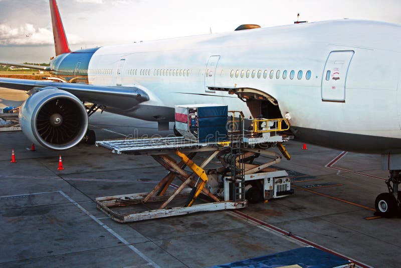 Loading cargo Airplane stock image. Image of cloudy, gate - 75093603