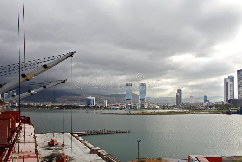 Loading Cargo of Cement Clinker in Bulk Carrier by Ships Cranes in the ...