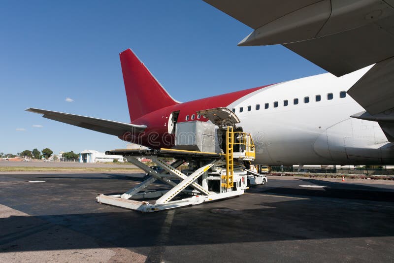 Loading cargo plane stock image. Image of corporate, carrier - 18400515