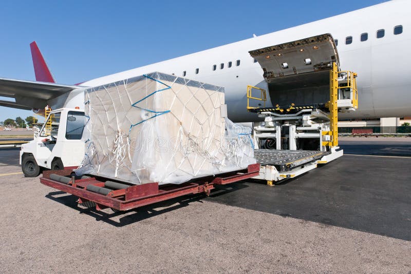 Loading cargo plane stock photo. Image of dock, boeing - 18399378