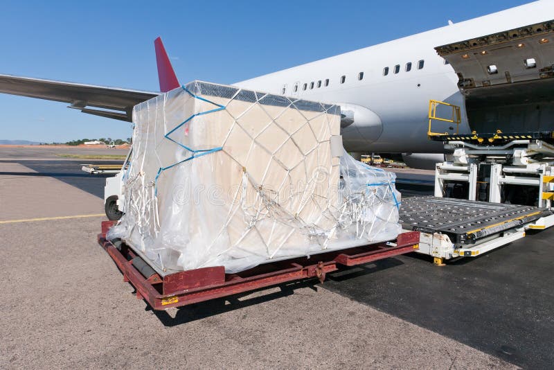 Loading cargo plane stock photo. Image of departure, dock - 21124476