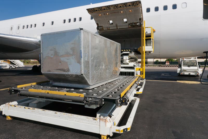 Loading cargo plane stock photo. Image of departure, plane - 21124482