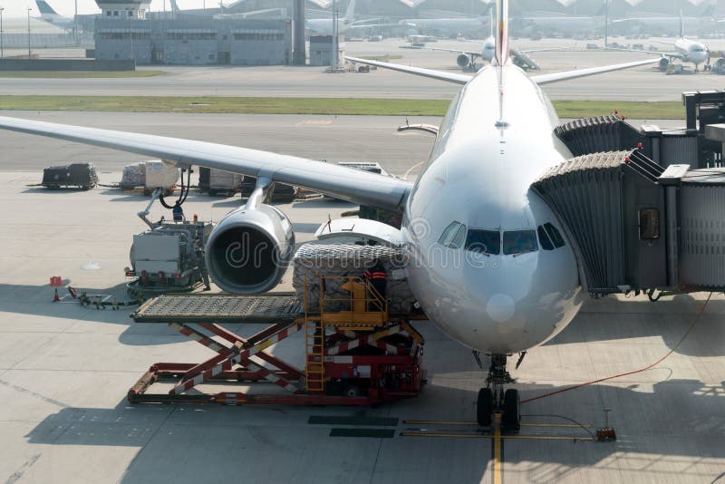 Loading Cargo Onto Aircraft Stock Image - Image of cargo, truck: 626733