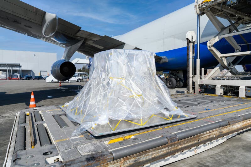 Loading of Cargo To the Aircraft Stock Photo - Image of shipment ...