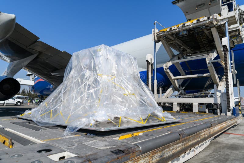 Loading of Cargo To the Aircraft Stock Photo - Image of aviation ...