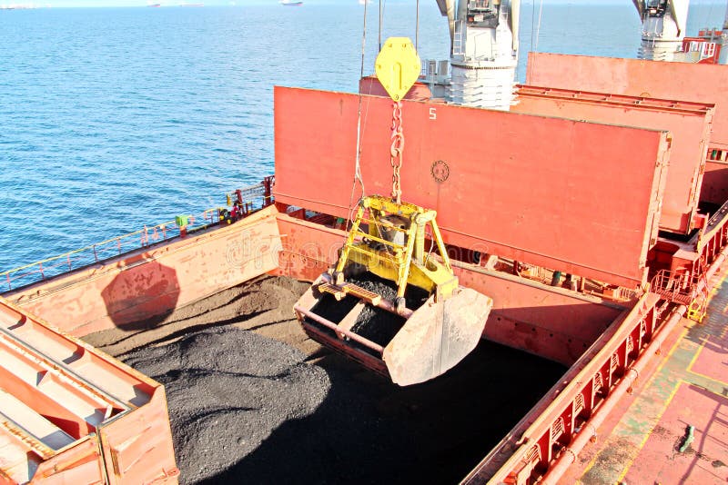 Loading Coal from Cargo Barges Onto a Bulk Carrier Using Ship Cranes ... Loading Coal from Cargo Barges Onto a Bulk Carrier Using Ship Cranes ...