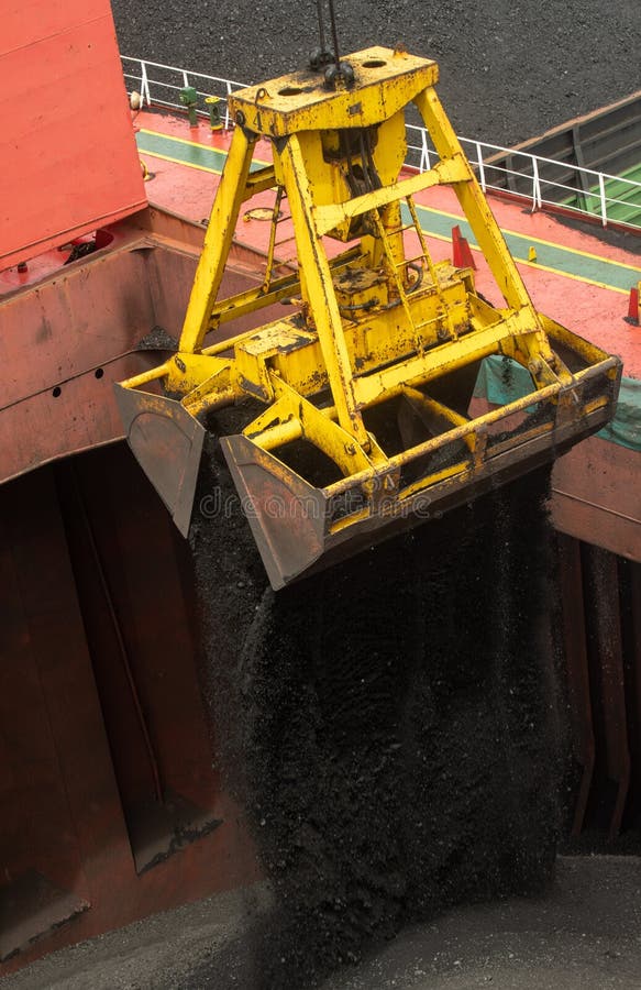 Loading Coal from Cargo Barges Onto a Bulk Vessel Using Ship Cranes in ...
