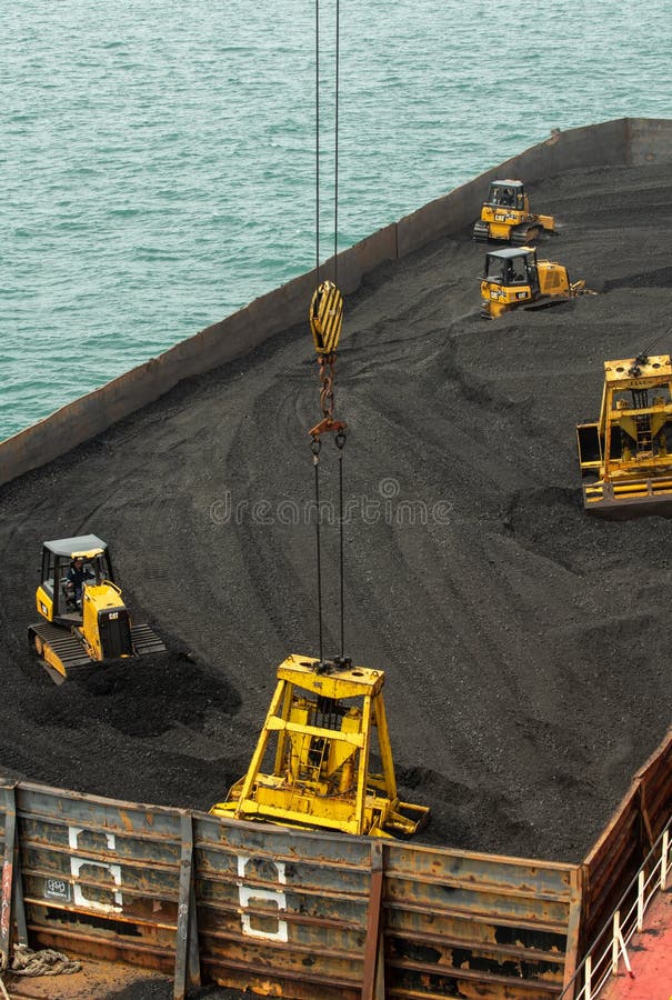 Loading Coal from Cargo Barges Onto a Bulk Vessel Using Ship Cranes ...