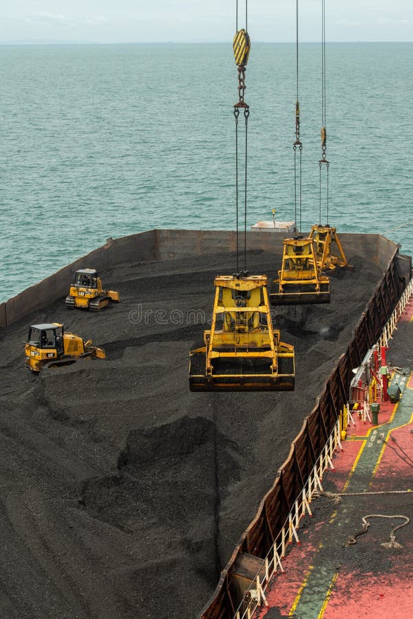 Loading Coal from Cargo Barges Onto a Bulk Vessel Using Ship Cranes ...