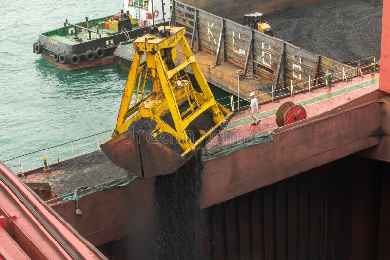 Loading Coal from Cargo Barges Onto a Bulk Vessel Using Ship Cranes in ... Loading Coal from Cargo Barges Onto a Bulk Vessel Using Ship Cranes in ...