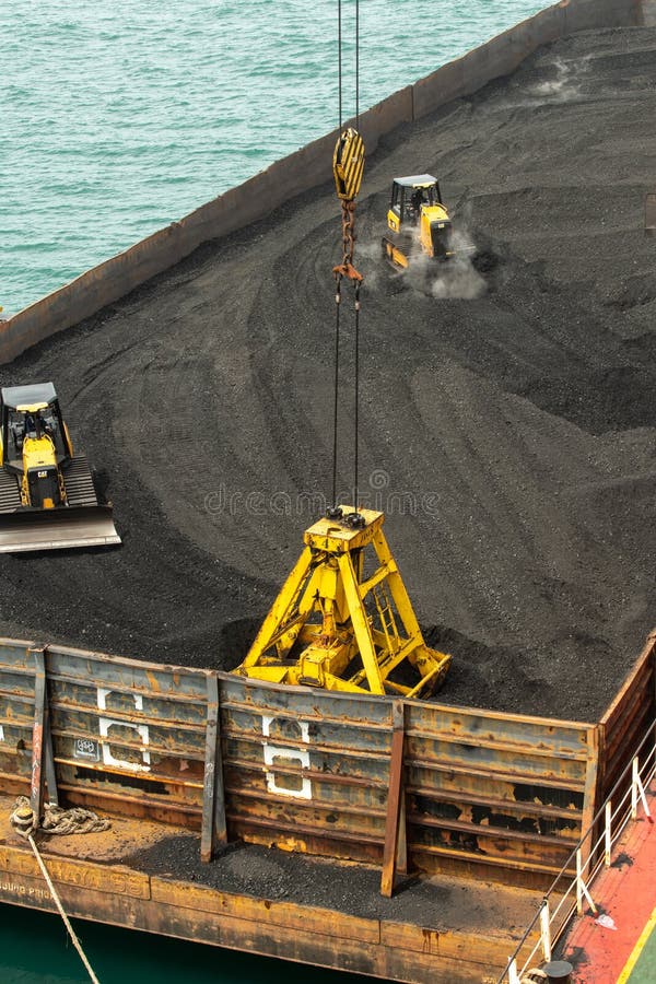 Loading Coal from Cargo Barges Onto a Bulk Vessel Using Ship Cranes ...