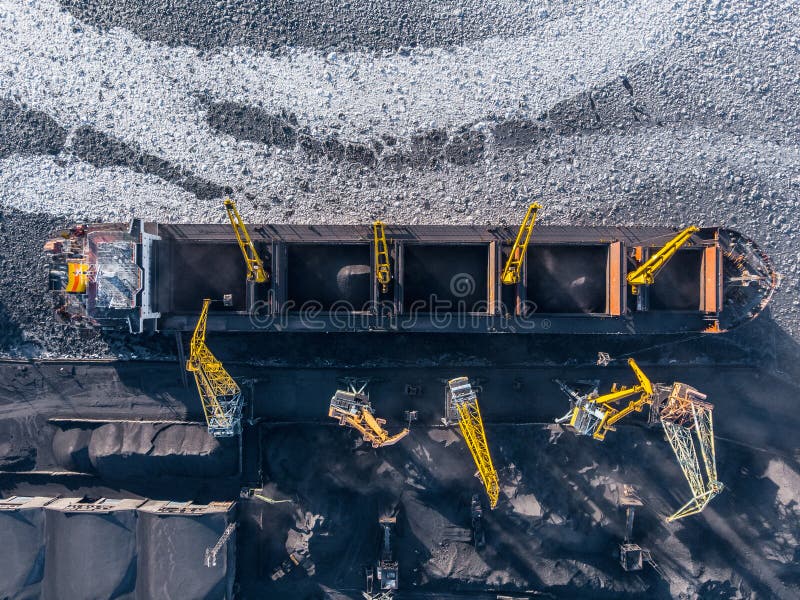 Loading Coal Mining in Port on Cargo Tanker Ship with Crane Bucket of ...