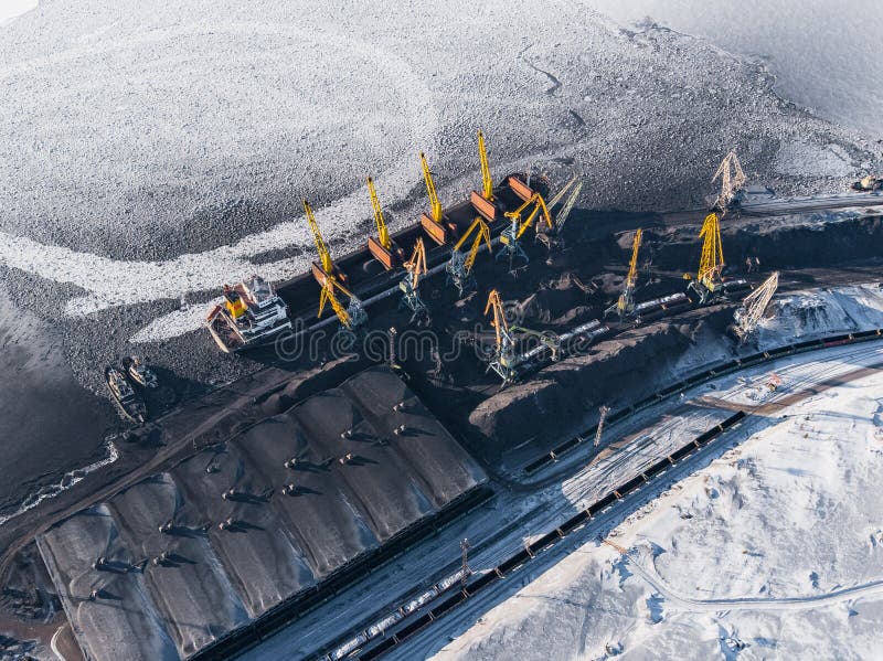 Loading Coal Mining in Port on Cargo Tanker Ship with Crane Bucket of ...