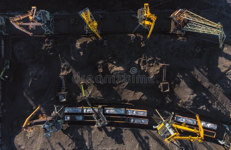 Loading Coal Mining in Port on Cargo Tanker Ship with Crane Bucket of ...