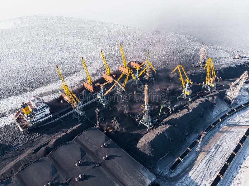 Loading Coal Mining in Port on Cargo Tanker Ship with Crane Bucket of ...