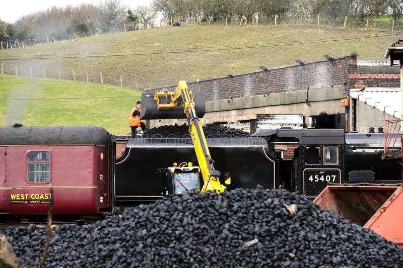 Loading Coal From Cargo Barges Onto A Bulk Vessel Using Ship Cranes ...