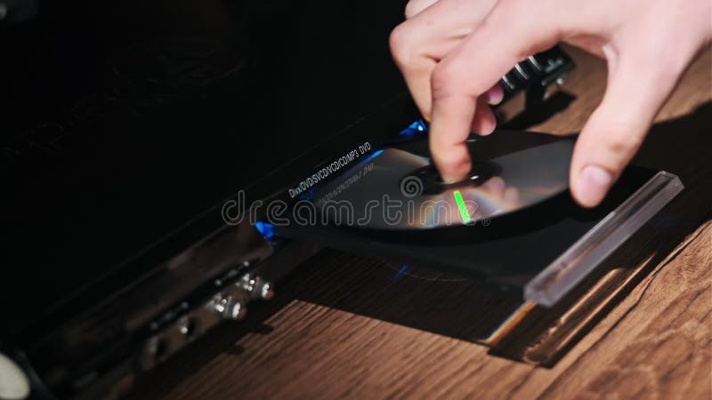 Loading Compact Disc into the DVD Player Stock Video - Video of ...