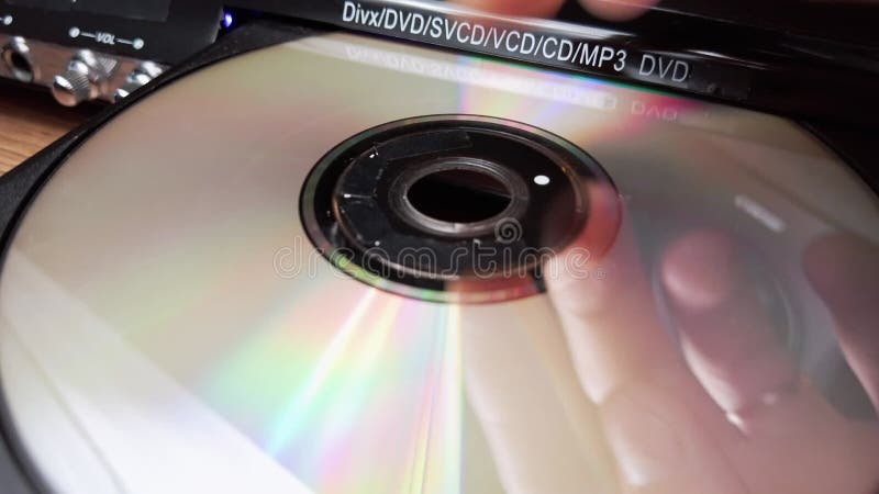 Loading Compact Disc into the DVD Player Stock Footage - Video of hand ...