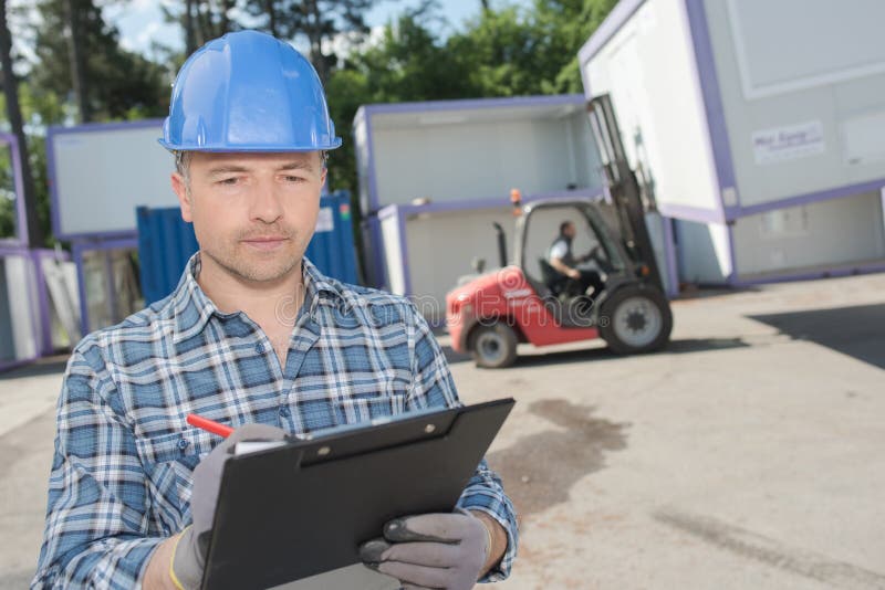 Loading a container box stock photo. Image of young - 133519888