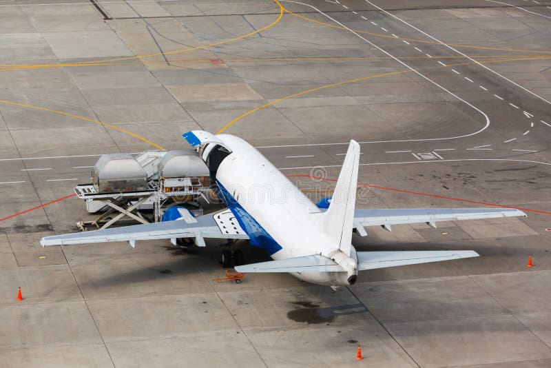 Loading Containers in the Cargo Aircraft Stock Photo - Image of ...