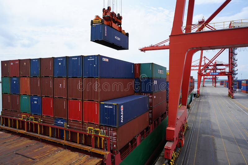 Loading Containers in Cargo Freight Ship with Industrial Crane ...