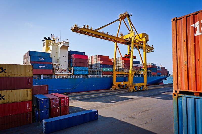 Loading Containers in Cargo Freight Ship with Industrial Crane ...