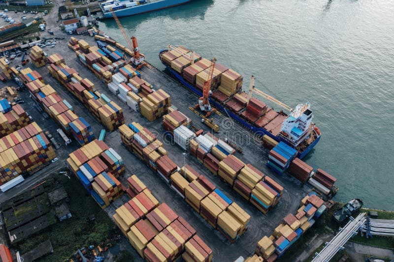 Loading of Containers into Cargo Ship in the Harbor Stock Photo - Image ...