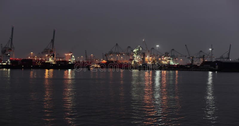 Loading Containers on a Cargo Ships at Night Stock Video - Video of ...