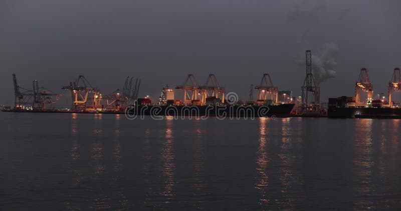 Loading Containers on a Cargo Ships at Night Stock Video - Video of ...
