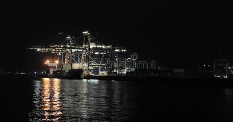 Loading Containers on a Cargo Ships at Night Stock Footage - Video of ...