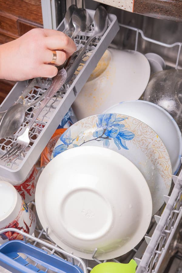 Loading Dishwasher Stock Photos - Download 351 Royalty Free Photos