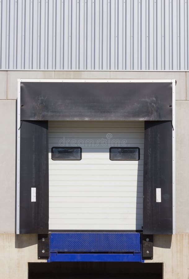 Loading Dock Bay Doors stock image. Image of loading - 84309771