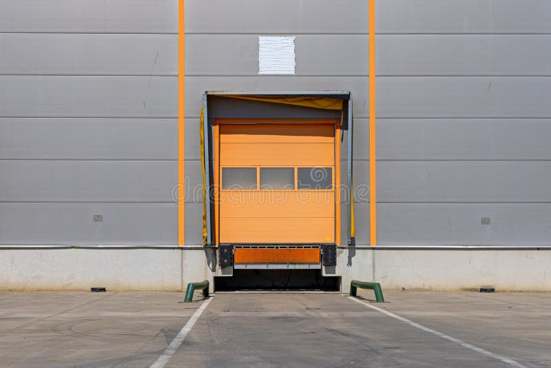 Loading Dock Cargo Door at a Shipping Warehouse Stock Photo - Image of ...