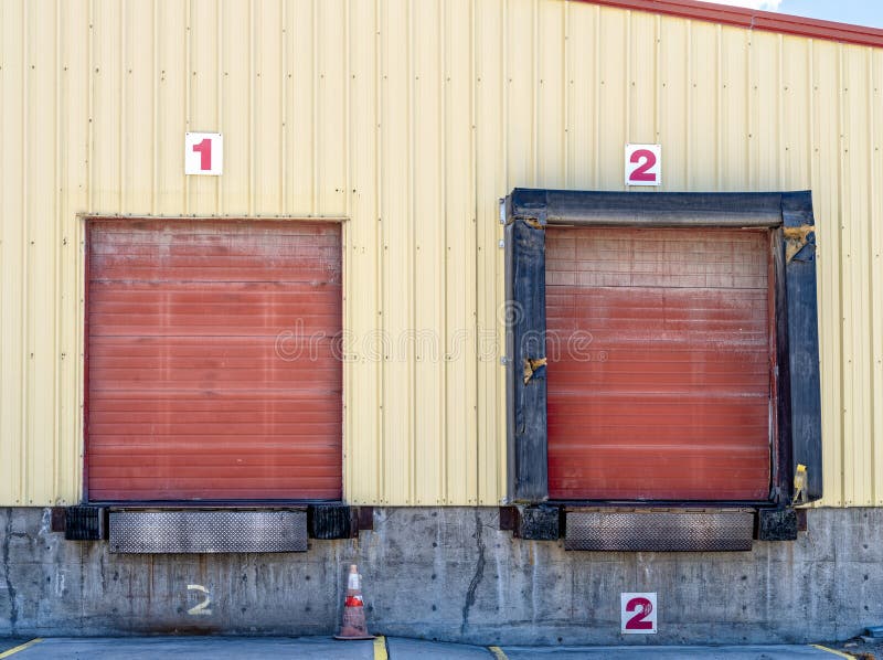 Loading Dock Doors Numbered One and Two on a Metal Building Stock Photo ...