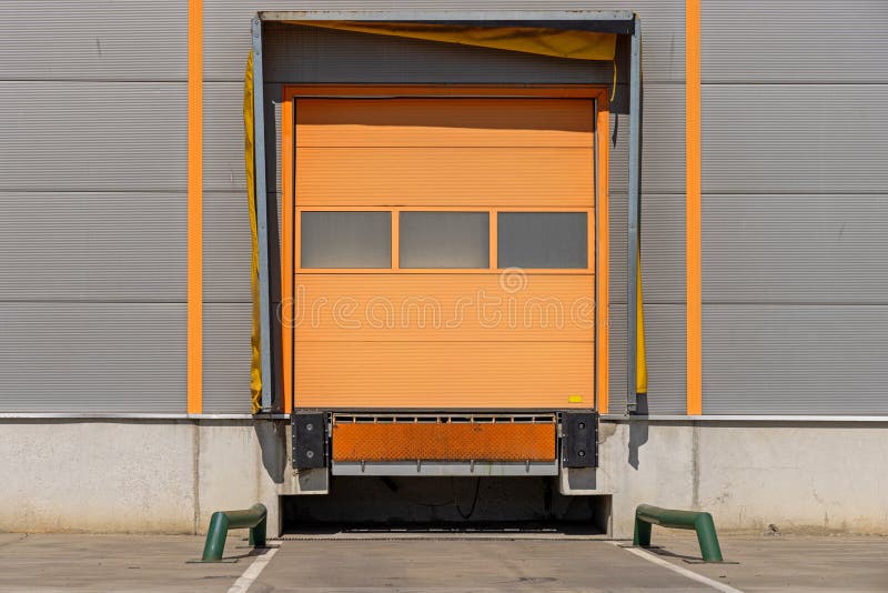 Loading Dock Cargo Door at a Shipping Warehouse Stock Photo - Image of ...