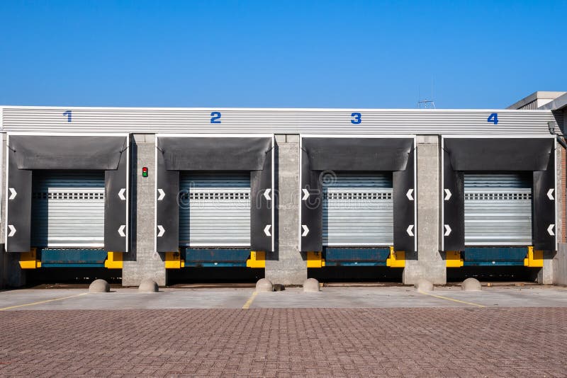 Row of Loading Docks with Shutter Doors at an Industrial Warehouse ...