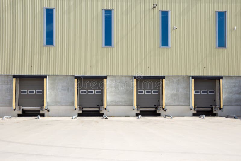 Row of Loading Docks with Shutter Doors at an Industrial Warehouse ...